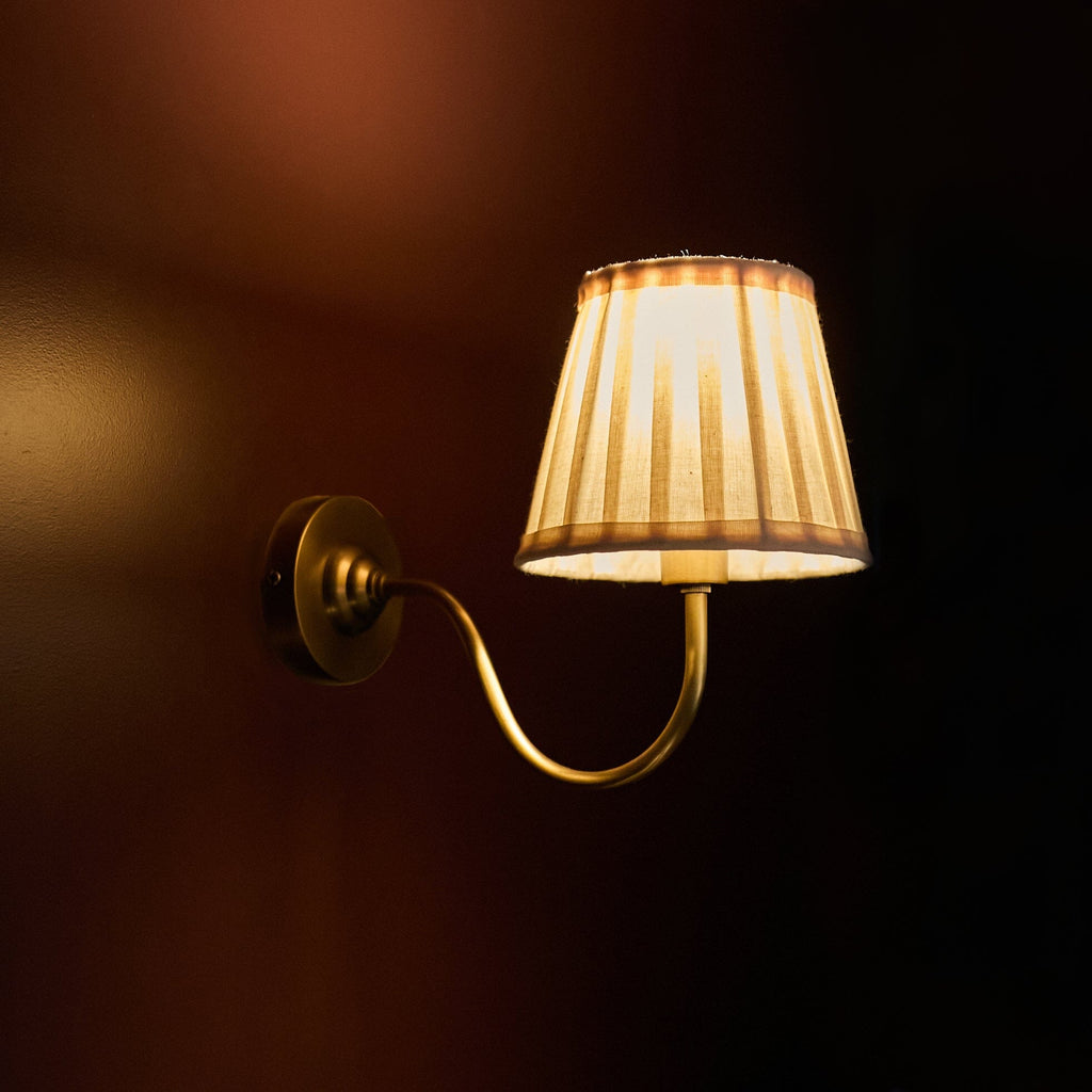 Brass Swan Neck Wall Light With Pleated Neutral Shade – Oriana B